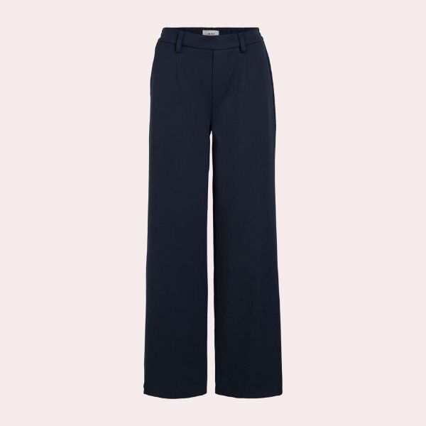 8 pantalones anchos que te harán parecer más alta