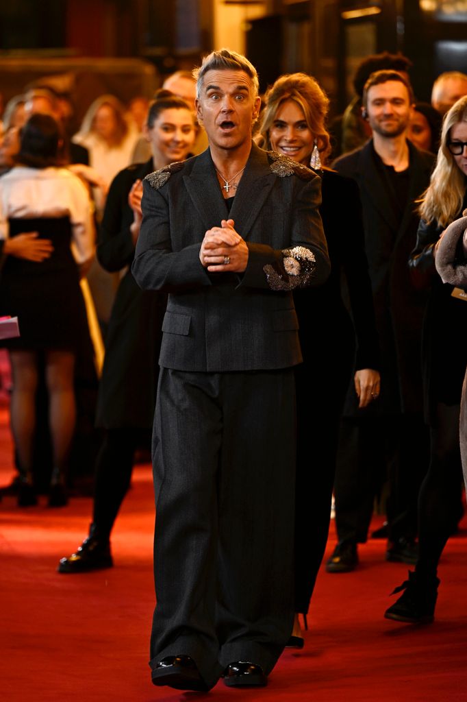 Robbie Williams, de estreno arropado por su mujer y su ex tras el ...