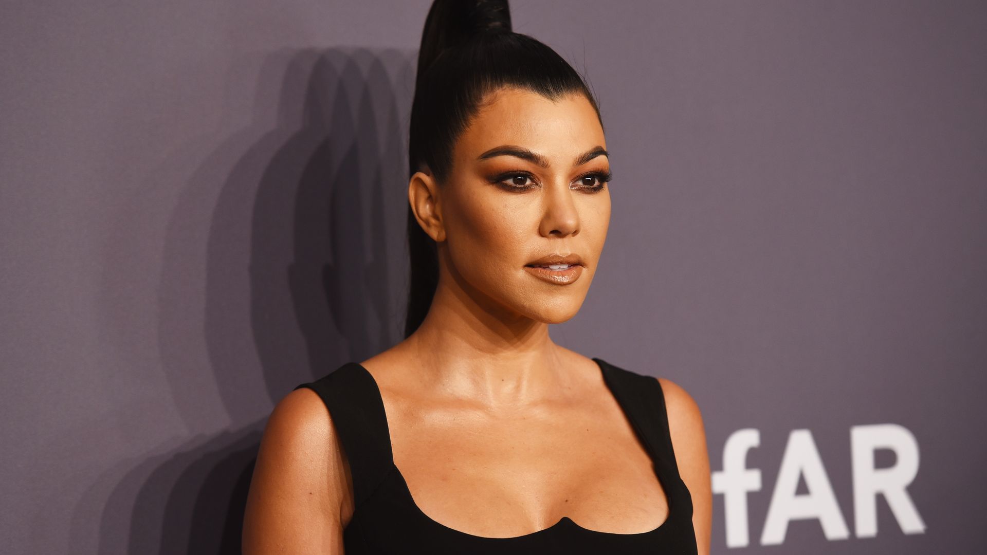 Kourtney Kardashian shows off her new bangs for 'witchy season'