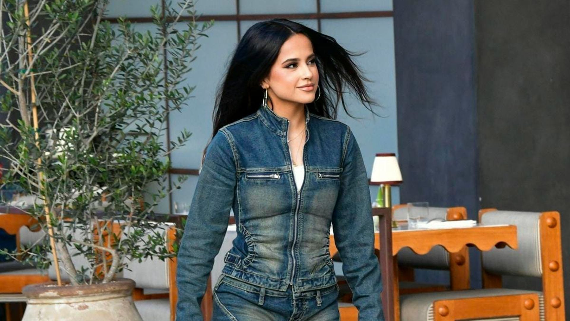 Becky G turned heads in a denim micro dress and cowboy boots