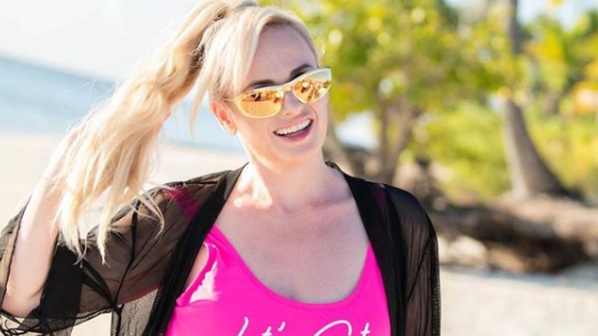 Rebel Wilson and her family twin in hot pink bathing suits