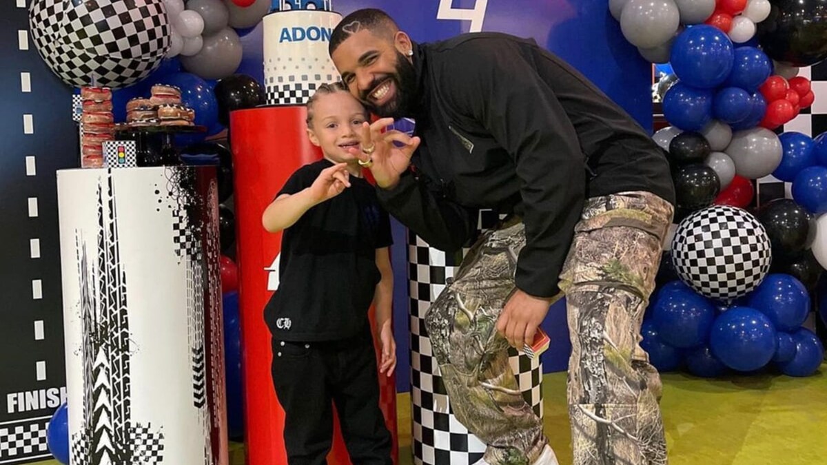 Drake proudly cheers on his son Adonis as he plays basketball