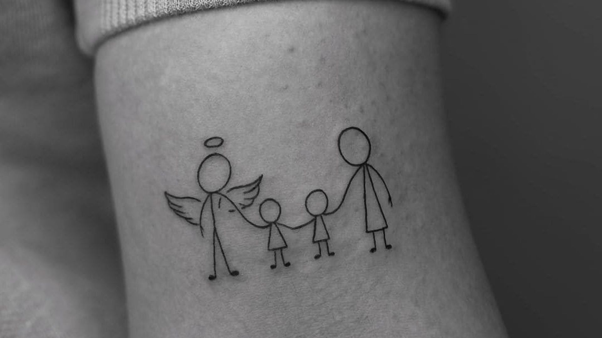 9 Symbolic family tattoo ideas to honor the ones you love most