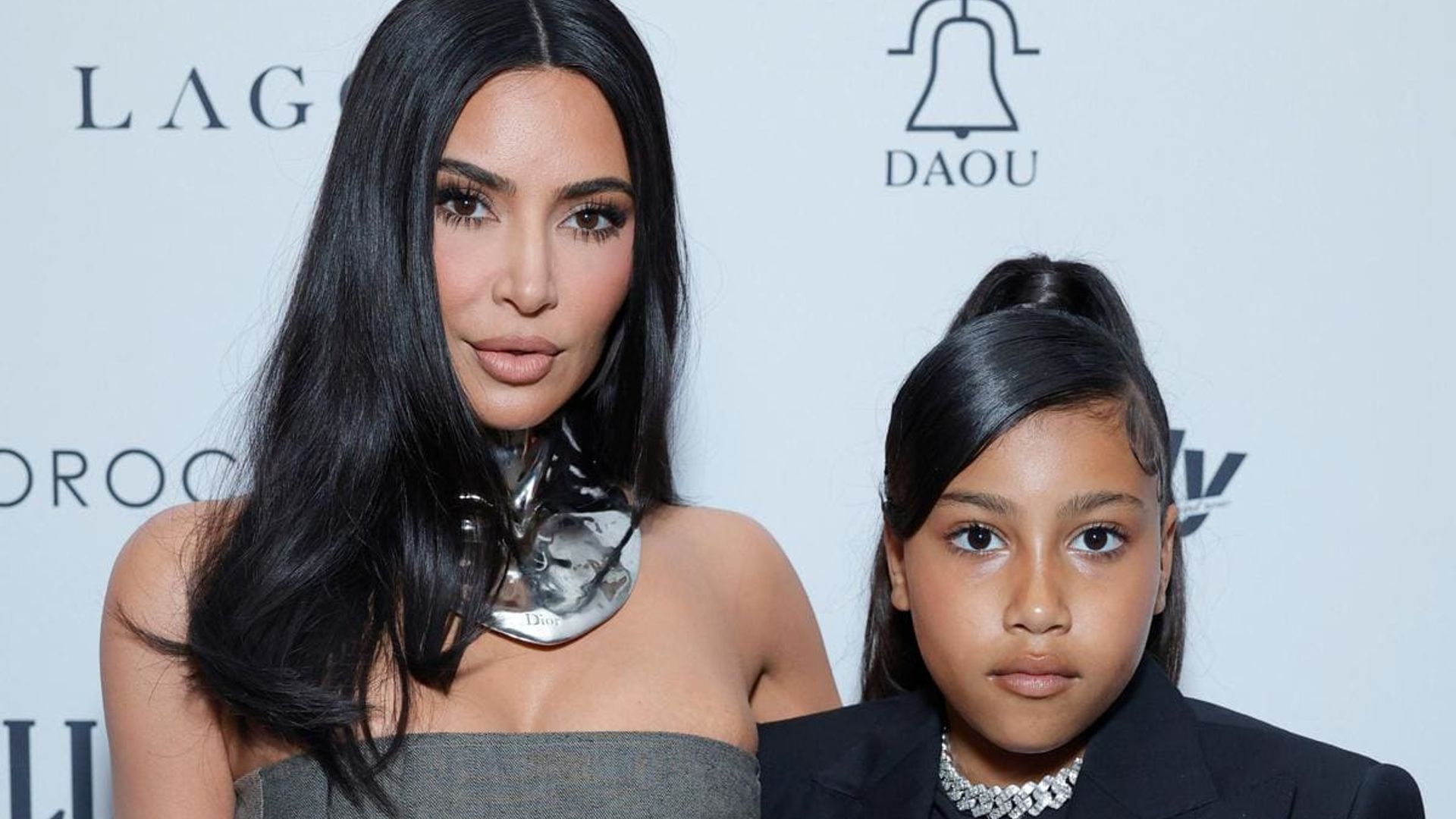 Kim Kardashian & North West match in leather at Lakers game