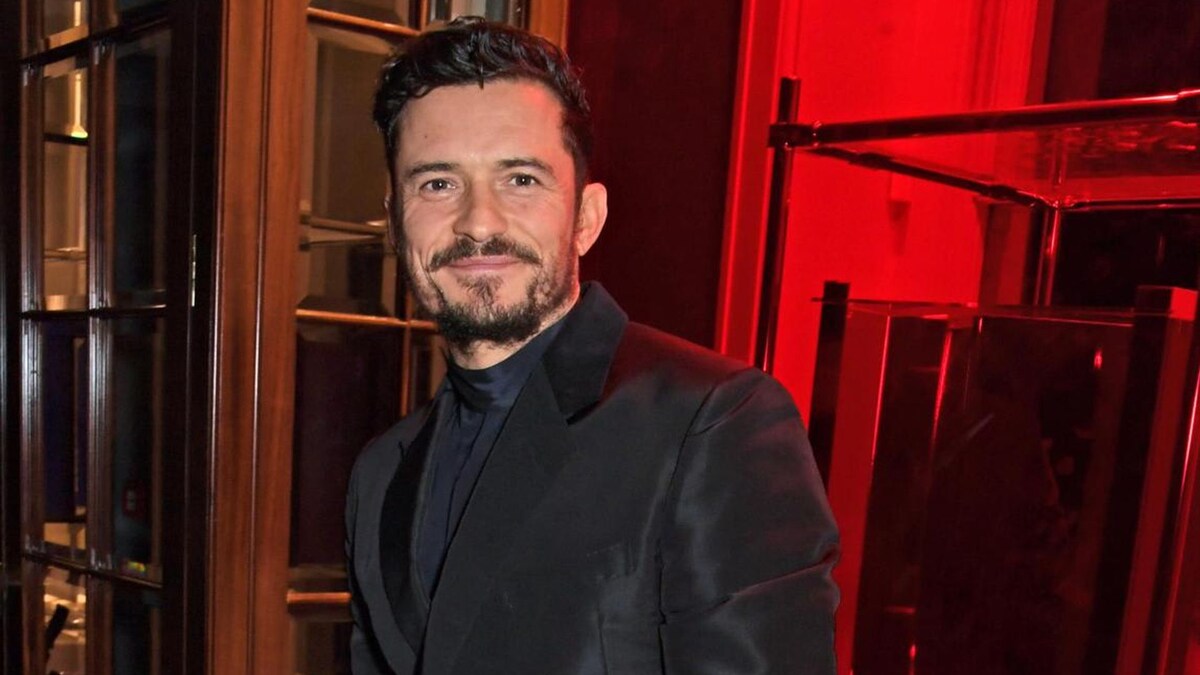 Orlando Bloom carries can of mace while running errands