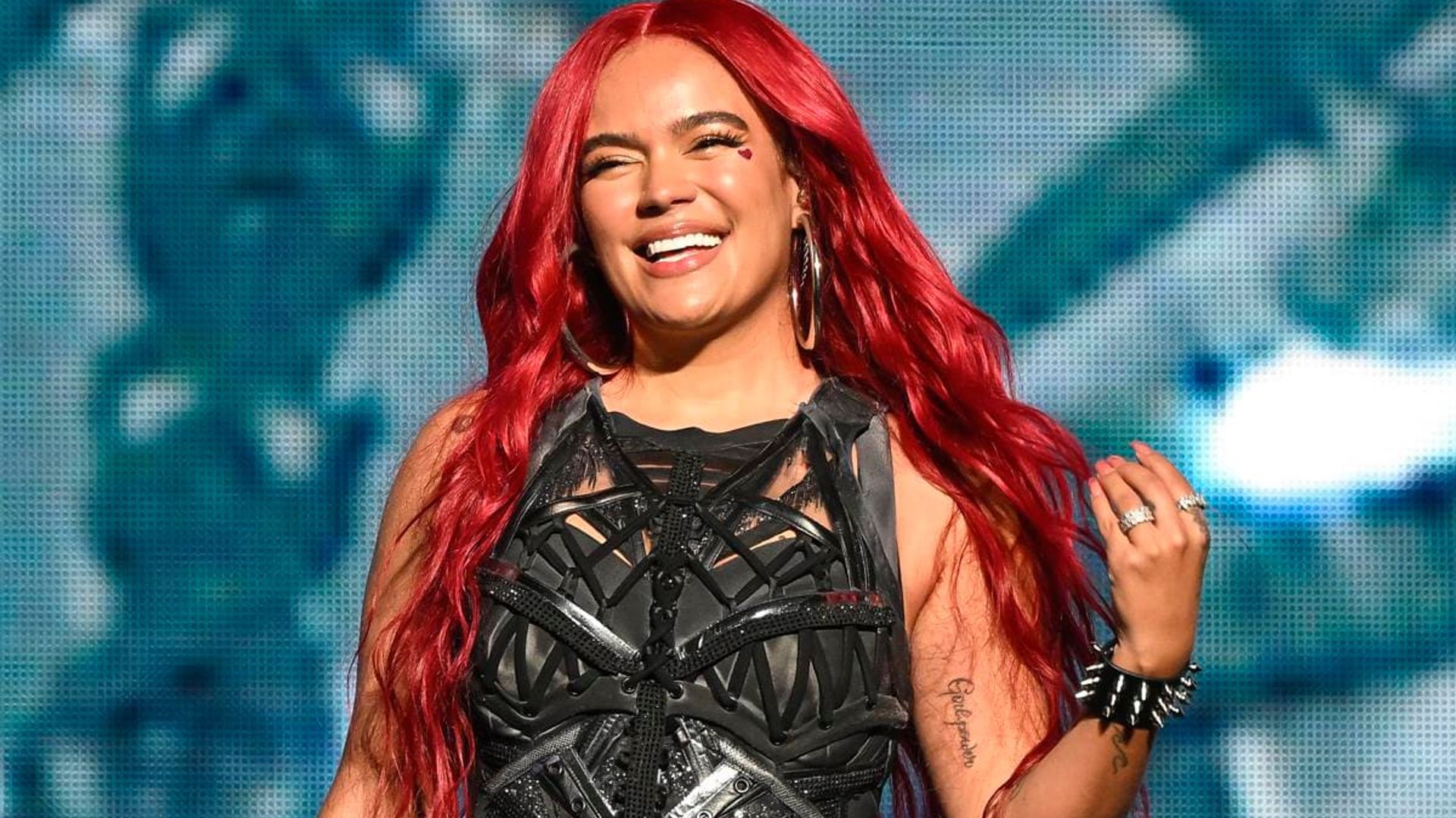 Karol G makes history as first woman to score No. 1 on Billboard 200 ...