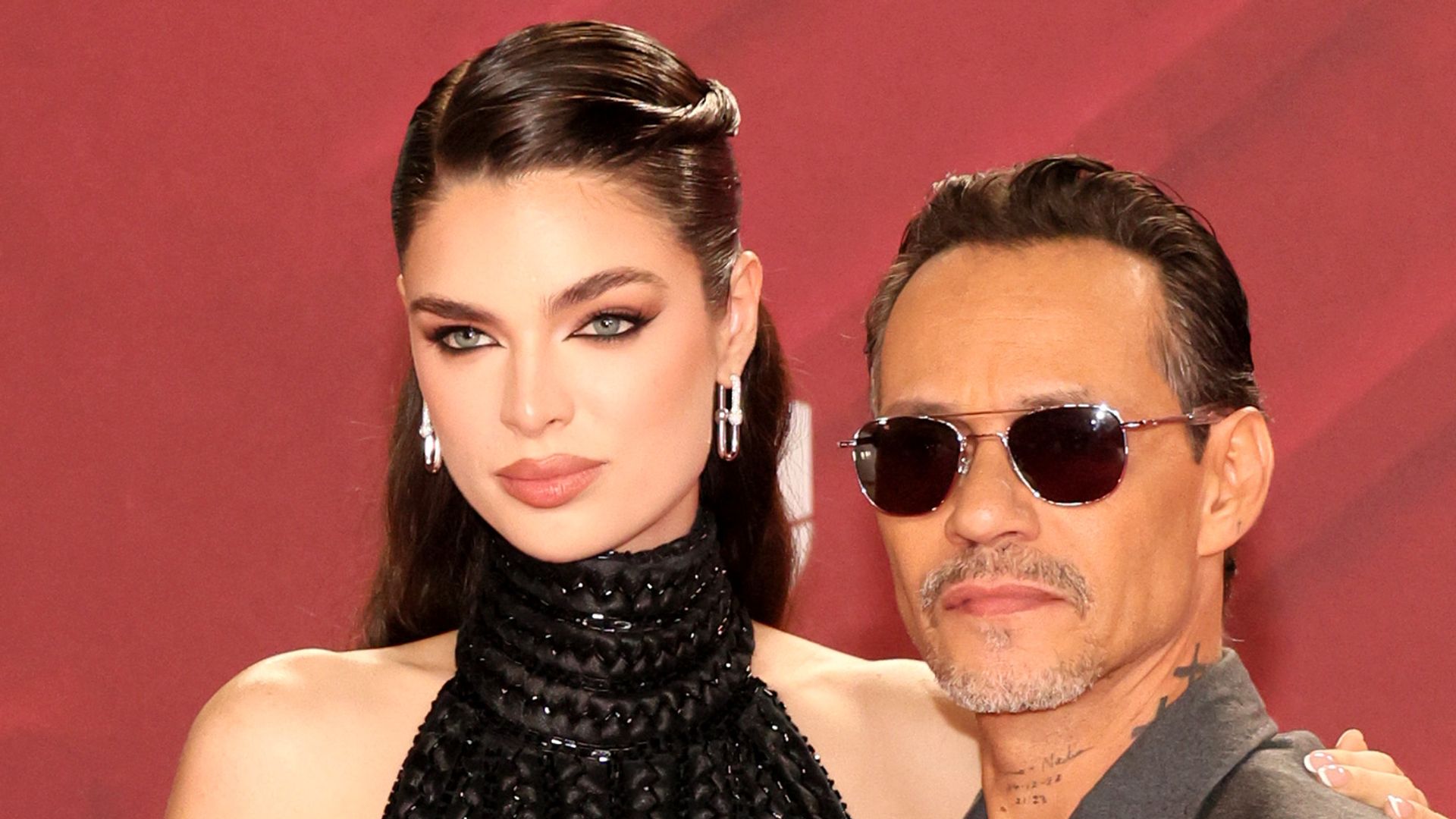 Kiss! Kiss! Nadia and Marc Anthony make sparks fly on the red carpet at ...