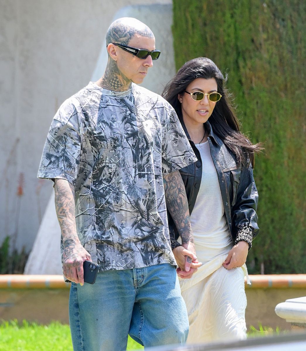 Kourtney Kardashian and Travis Barker bring baby Rocky to his first ...