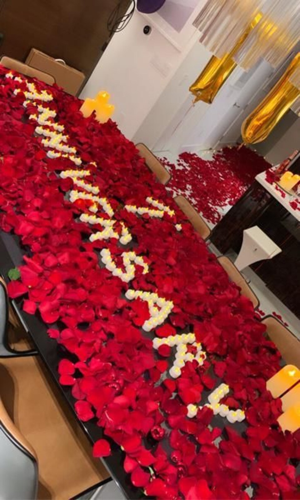 Karol G is showered with roses by fiancé Anuel AA