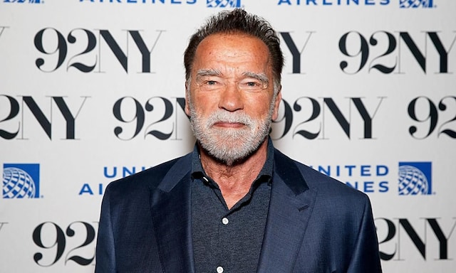 Arnold Schwarzenegger’s bodyguard is so tall he goes viral
