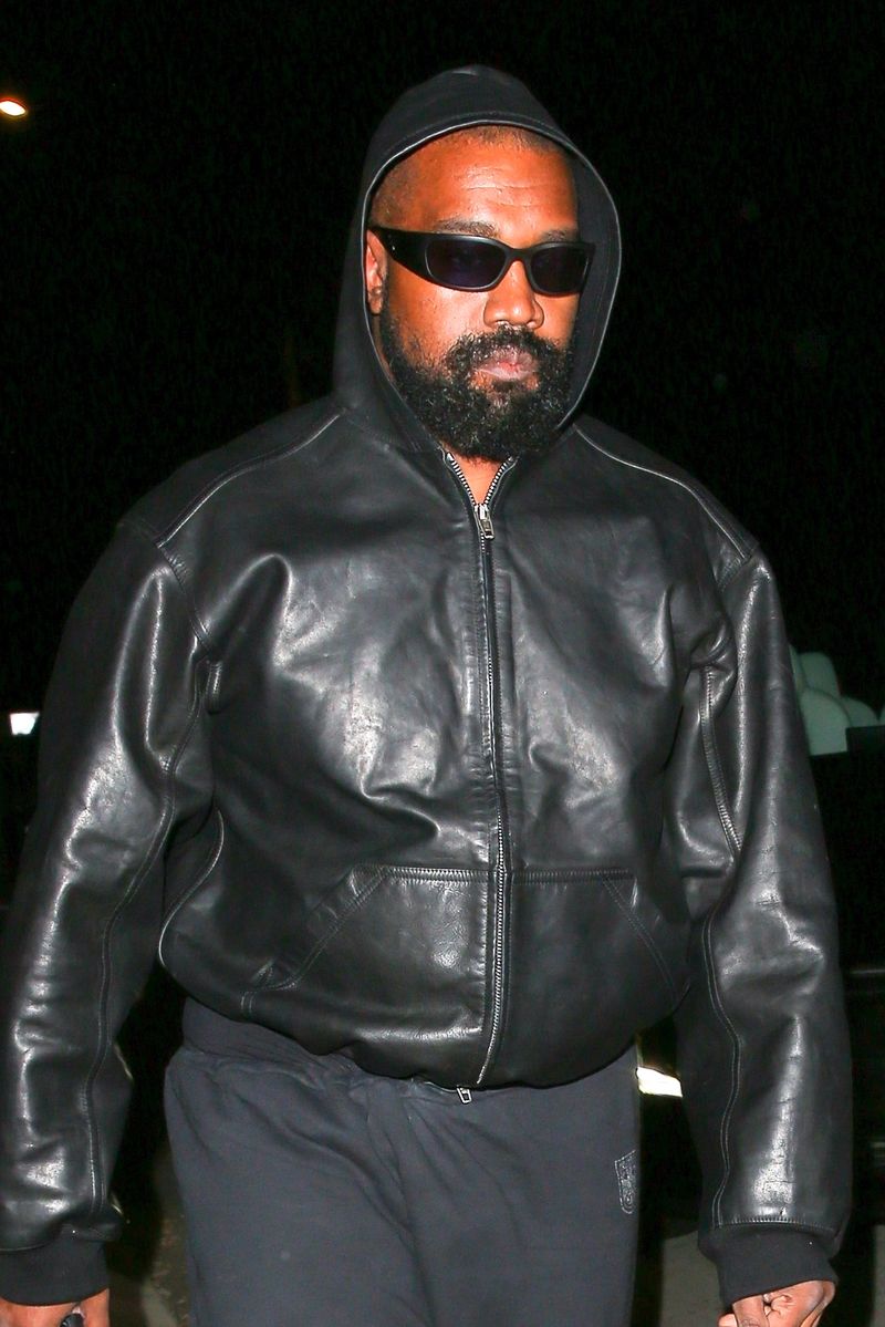 Kanye West performs with his four kids in China