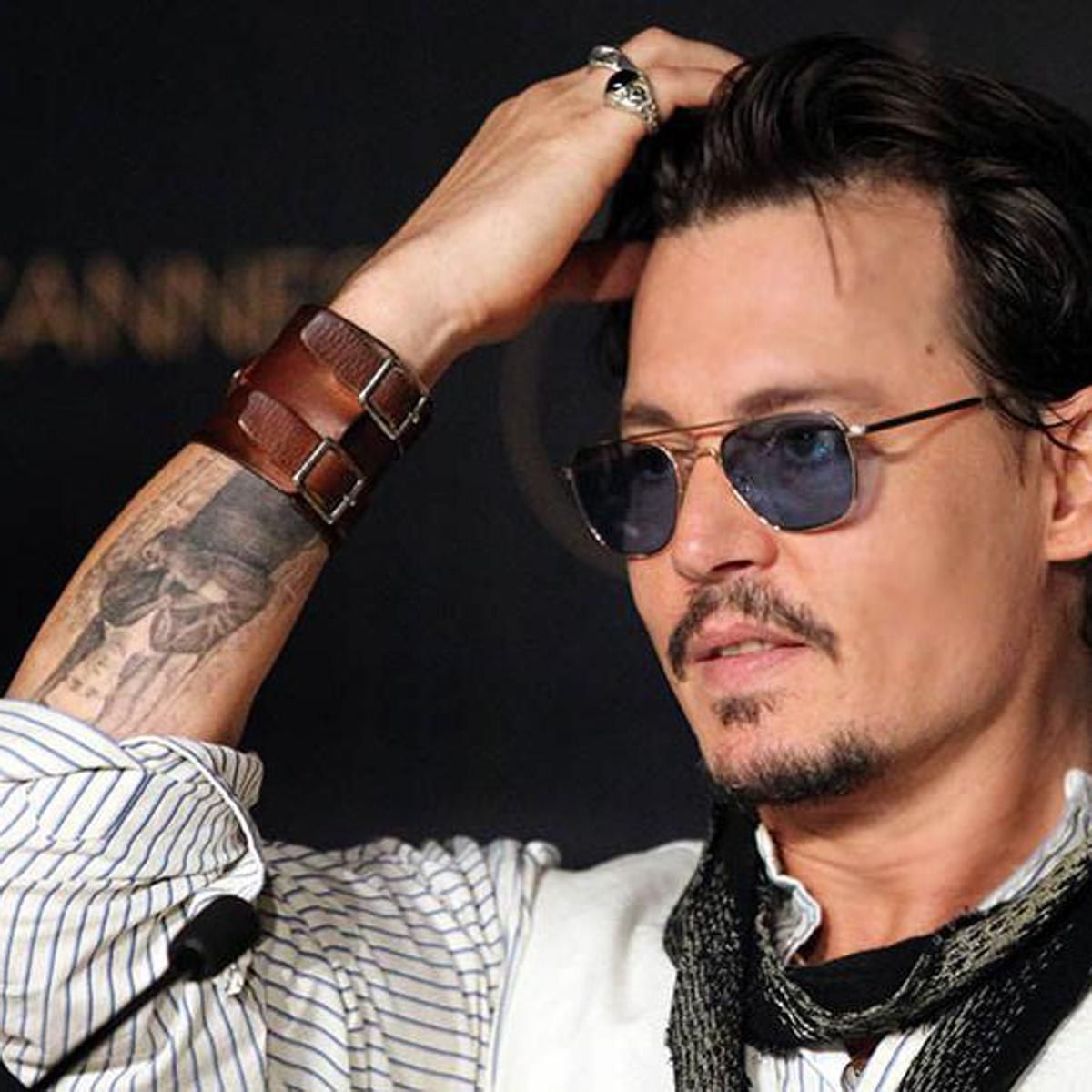 Johnny Depp's tattoos tell the story of his life