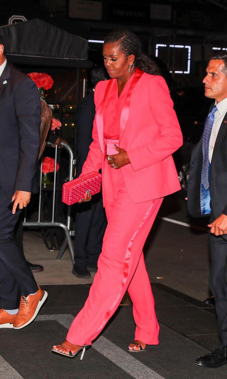 Michelle Obama looks stunning in a pink power suit