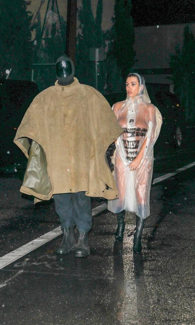 Bianca Censori wears nothing but a clear raincoat in LA storm
