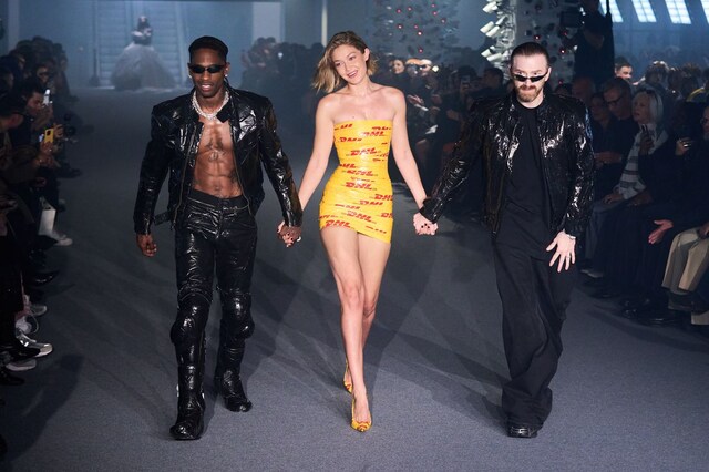 Gigi Hadid Walks The Catwalk While Wrapped In Dhl Tape