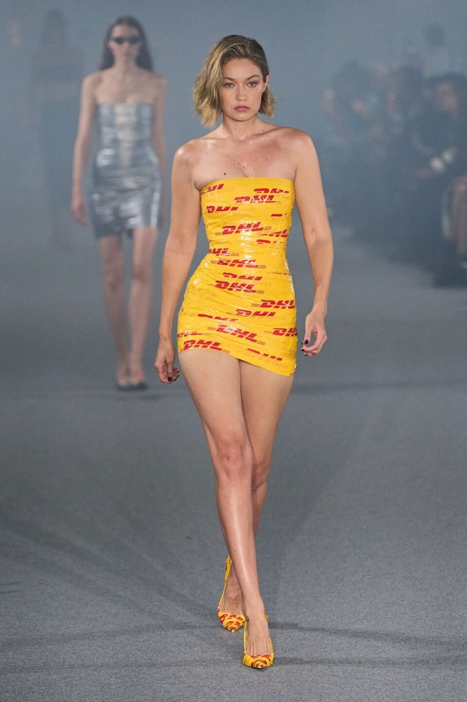 Gigi Hadid Walks The Catwalk While Wrapped In Dhl Tape