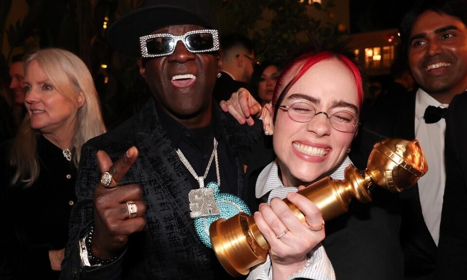 Flavor Flav gifts Billie Eilish a Barbie clock necklace