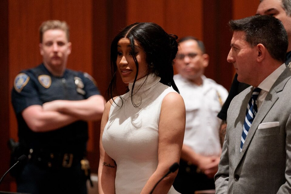 Cardi B is being sued for her infamous mic-throwing incident in Vegas