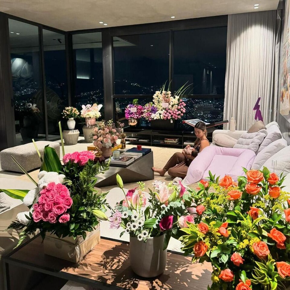 Maluma shows off the pictures of his first days as Paris's dad.