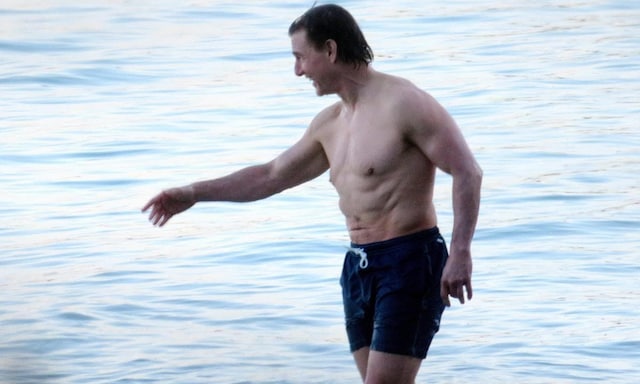 Tom Cruise shows off his ripped abs while in Spain