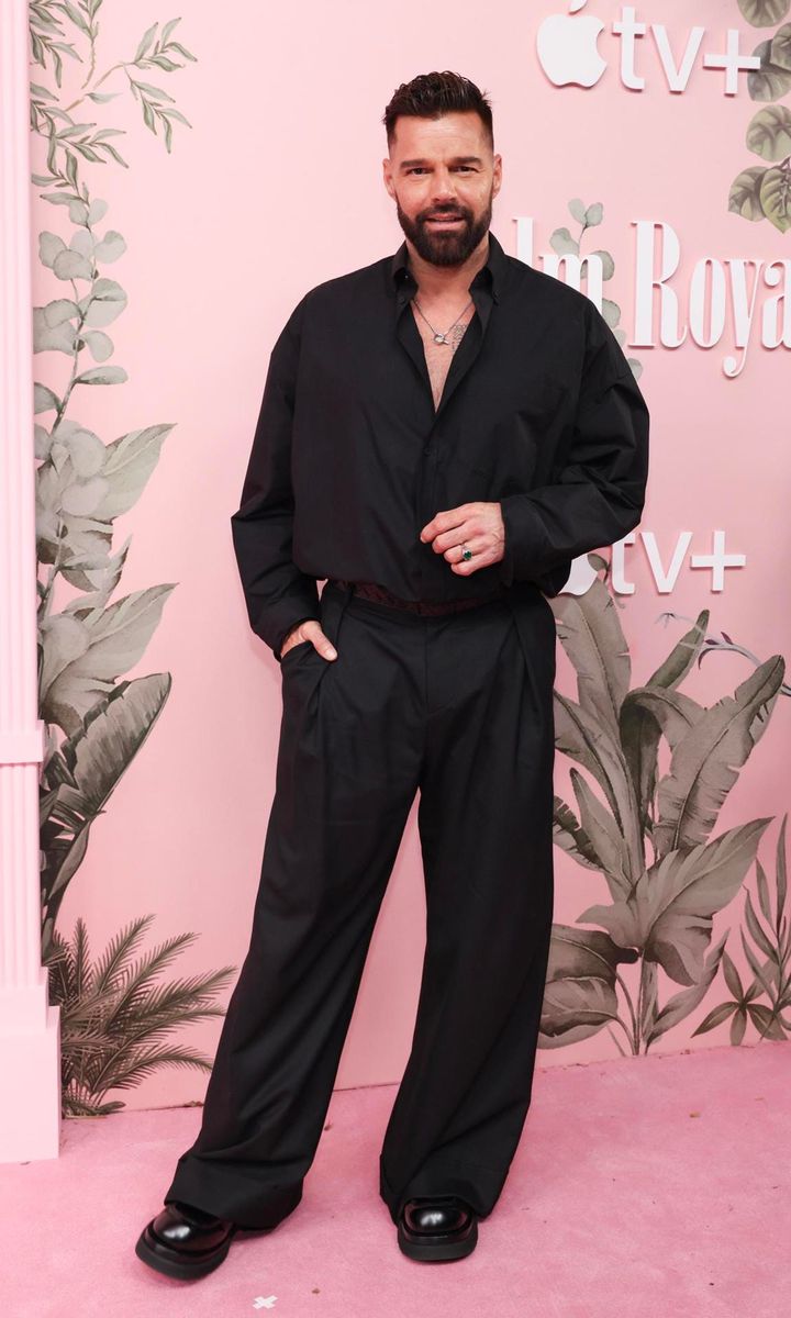 Ricky Martin poses on the red carpet with his twins Valentino and Matteo