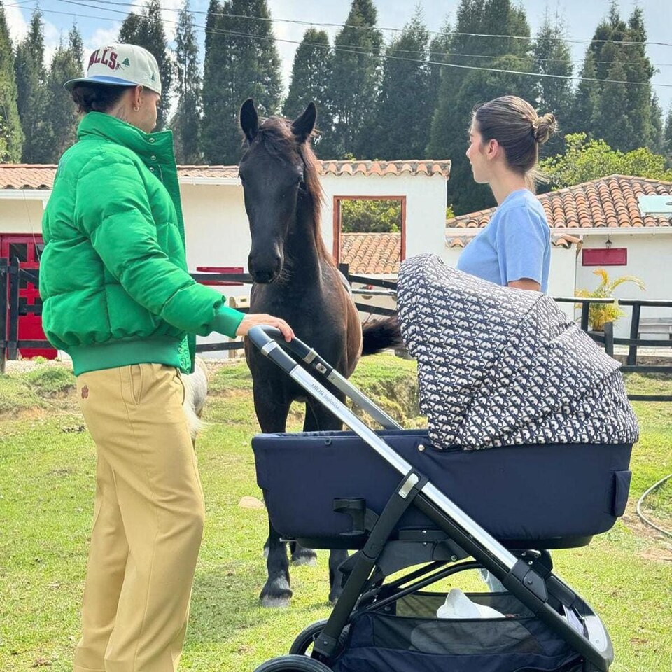 Maluma shows off the pictures of his first days as Paris's dad.