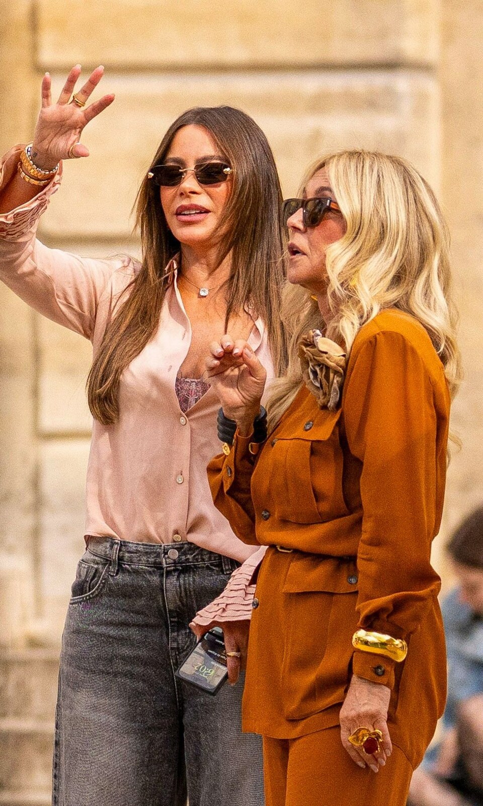 Sofia Vergara goes lingerie-chic in bra and satin shirt look