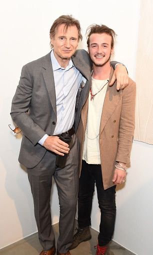 Liam Neeson supports son Micheál at gallery opening