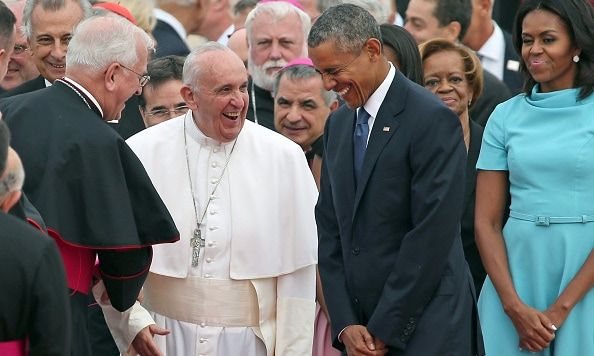 President Obama and his family greet Pope Francis as he arrives in the U.S.